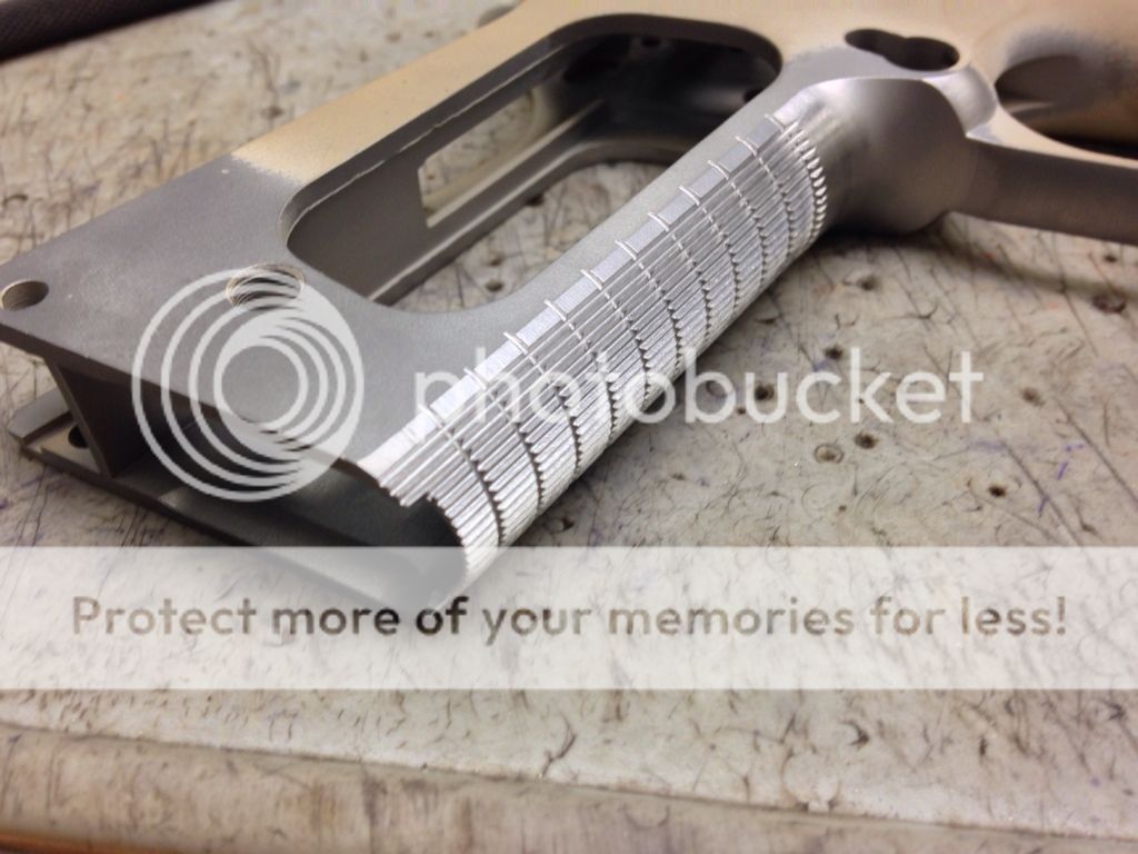 In between checkering and serrations. | 1911 Firearm Addicts